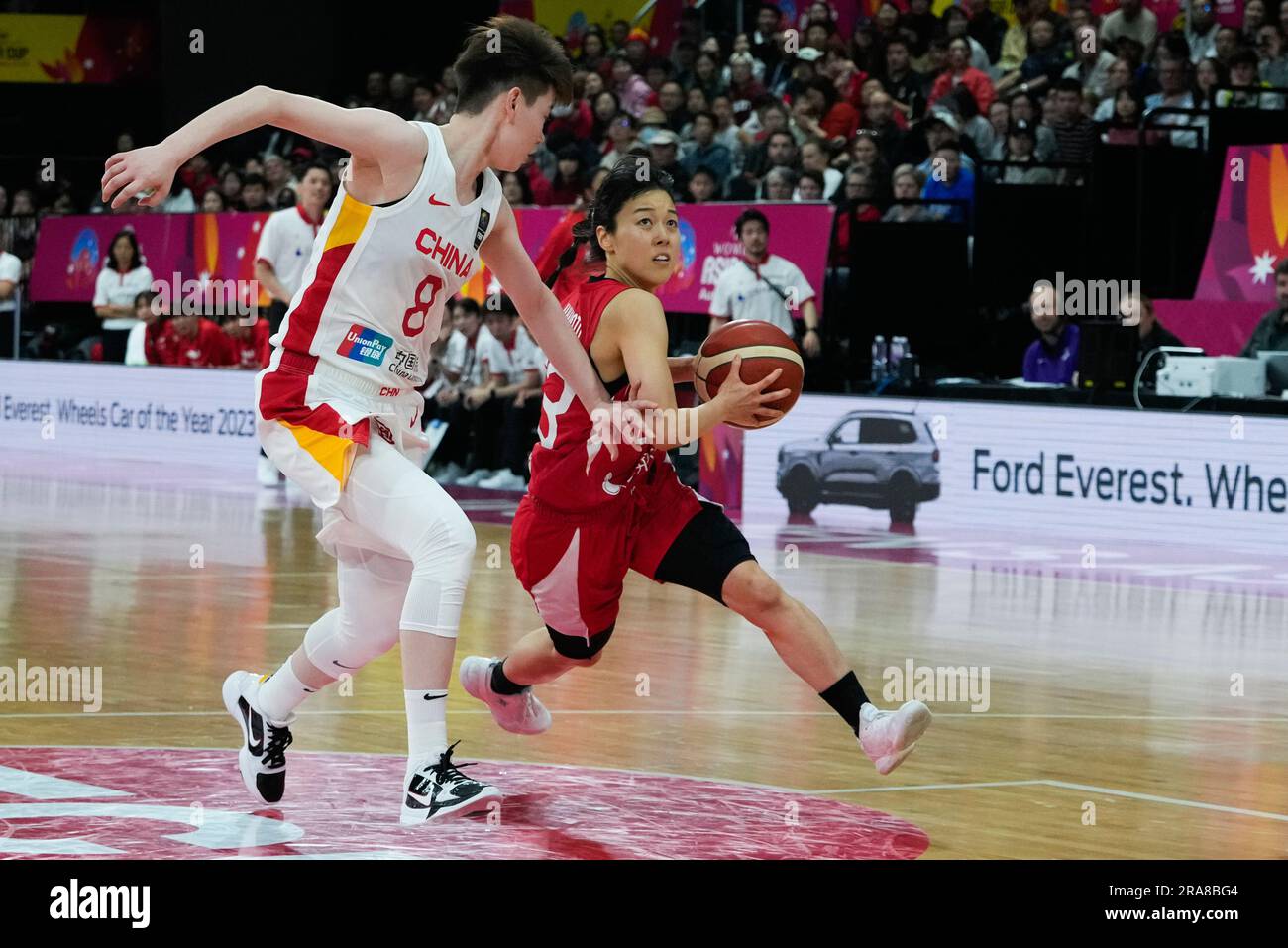 Japan's Mai Yamamoto, right, runs past China's Jin Weina during the ...
