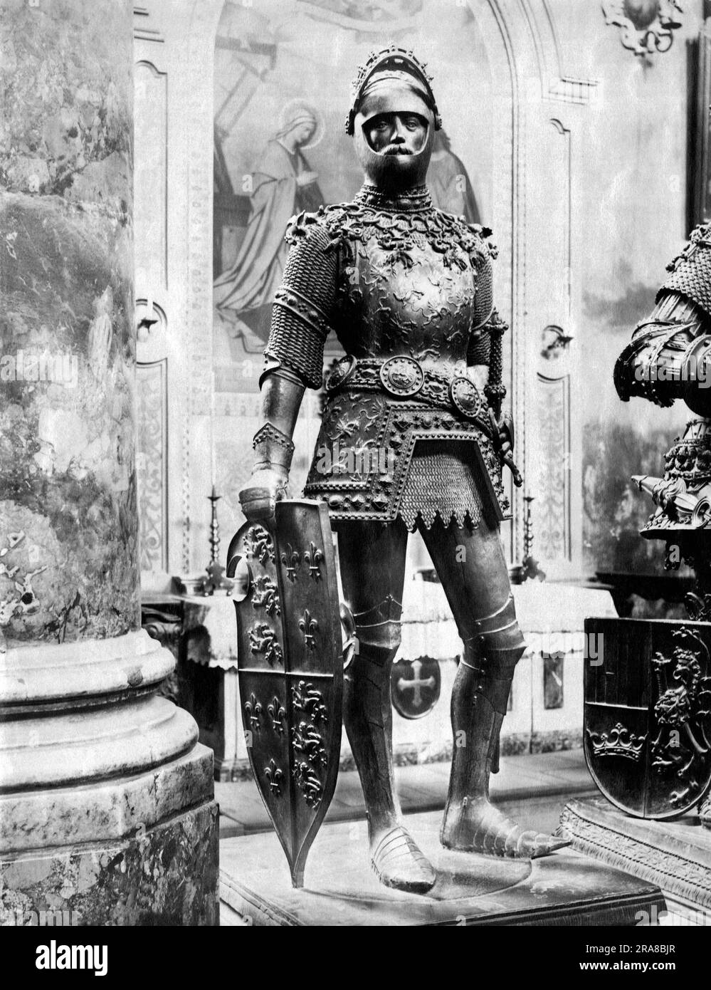 World: c. 1880. A man standing in a knight's armor Stock Photo - Alamy