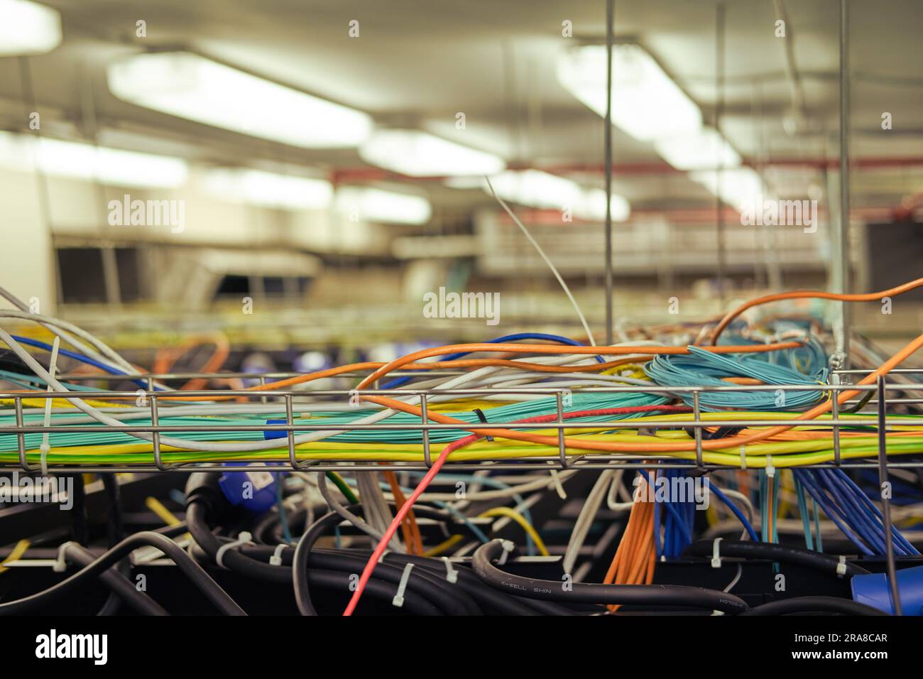 The web of cables in the server room can be confusing to navigate. The ...