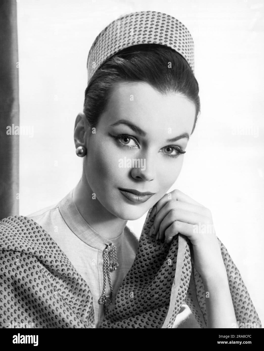 United States: 1957 A fashionable young woman wearing silk apparel to ...