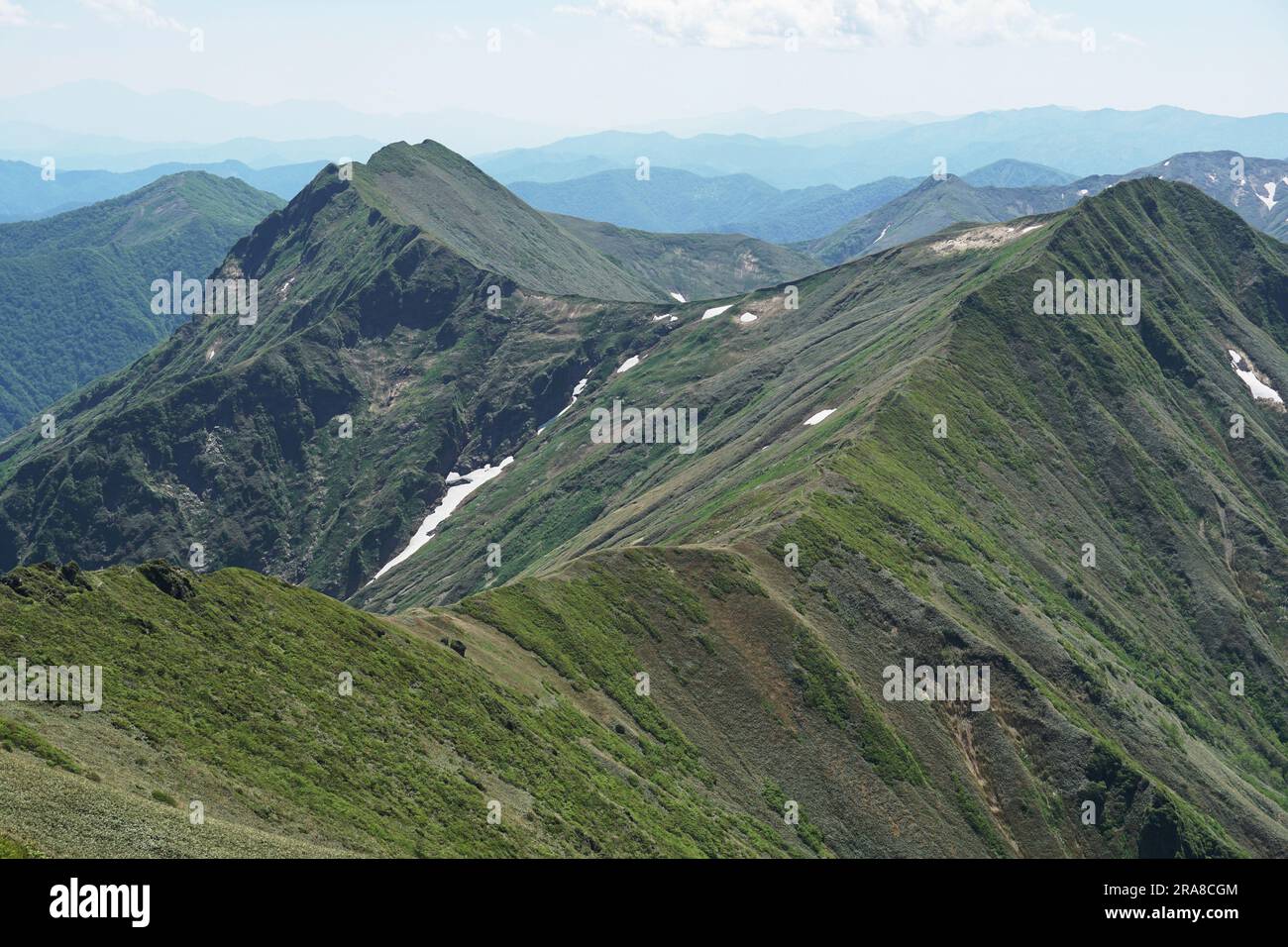 The ridges of mountains are pictured from Mount Tanigawa in Minakami ...