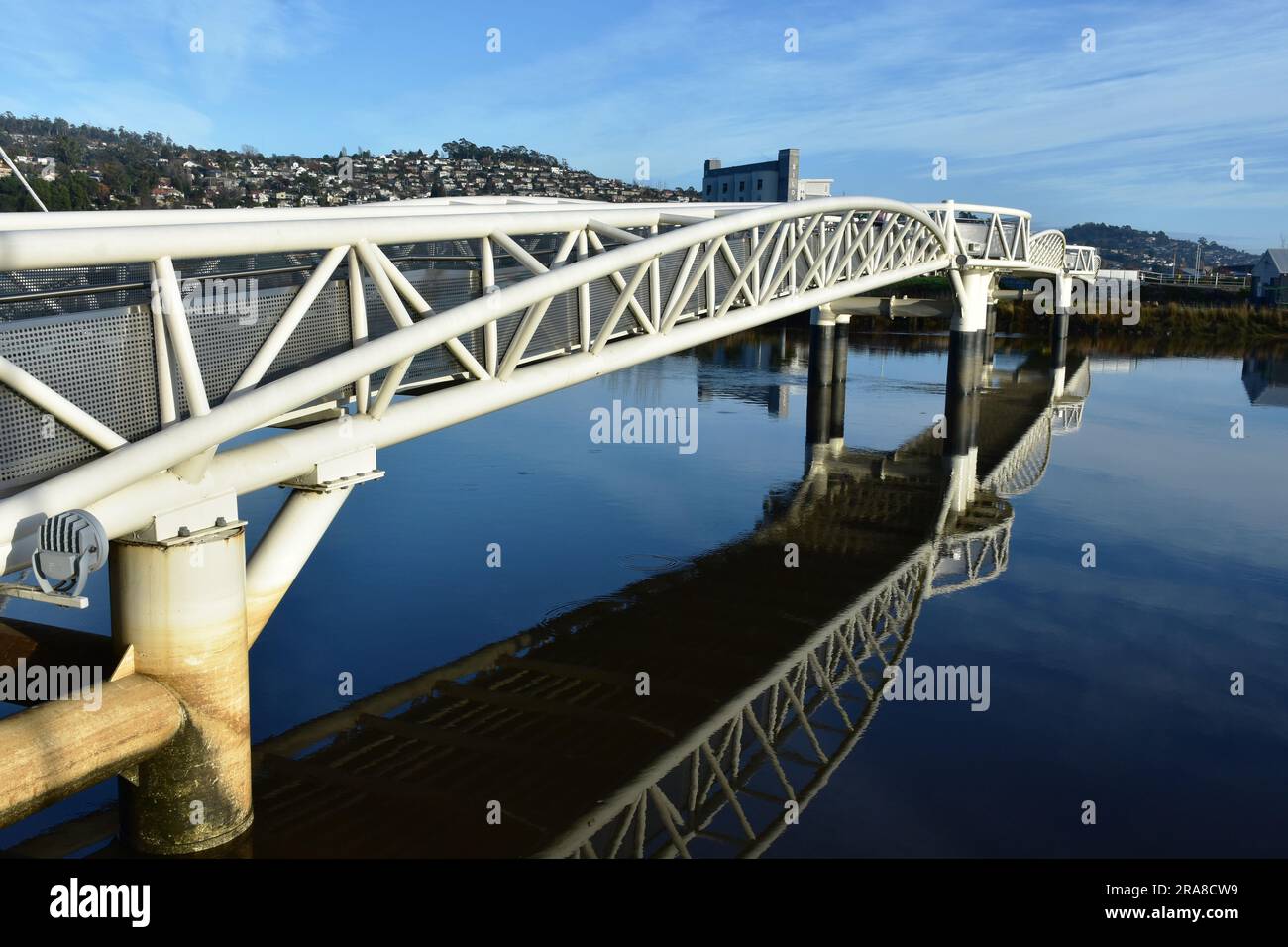 Metal bridge on water with reflecion Stock Photo - Alamy
