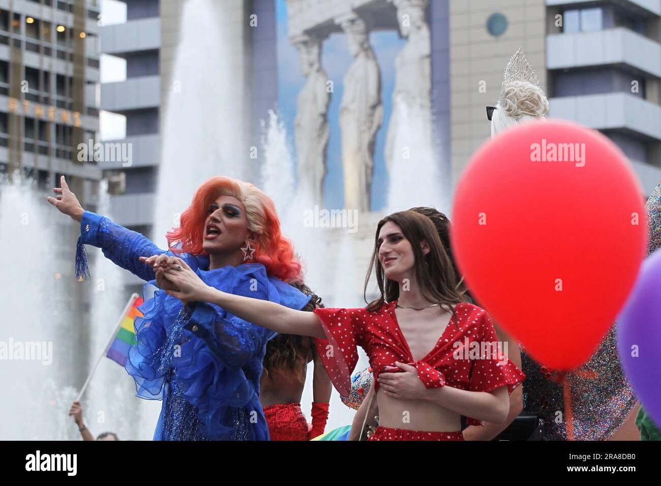People sing and dance as they participate in the annual Gay Pride ...