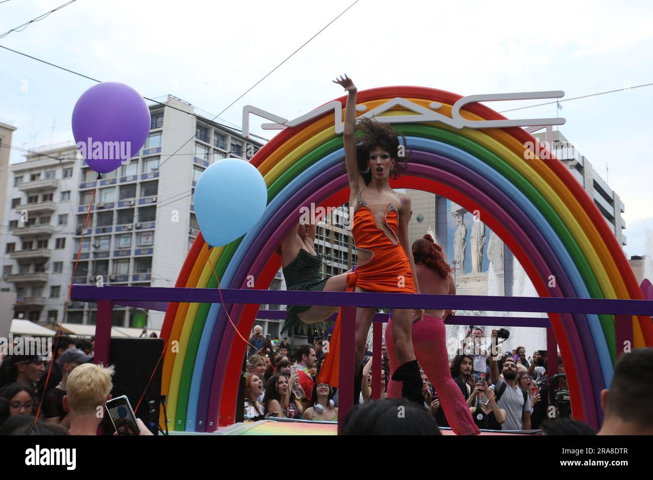 People sing and dance as they participate in the annual Gay Pride ...