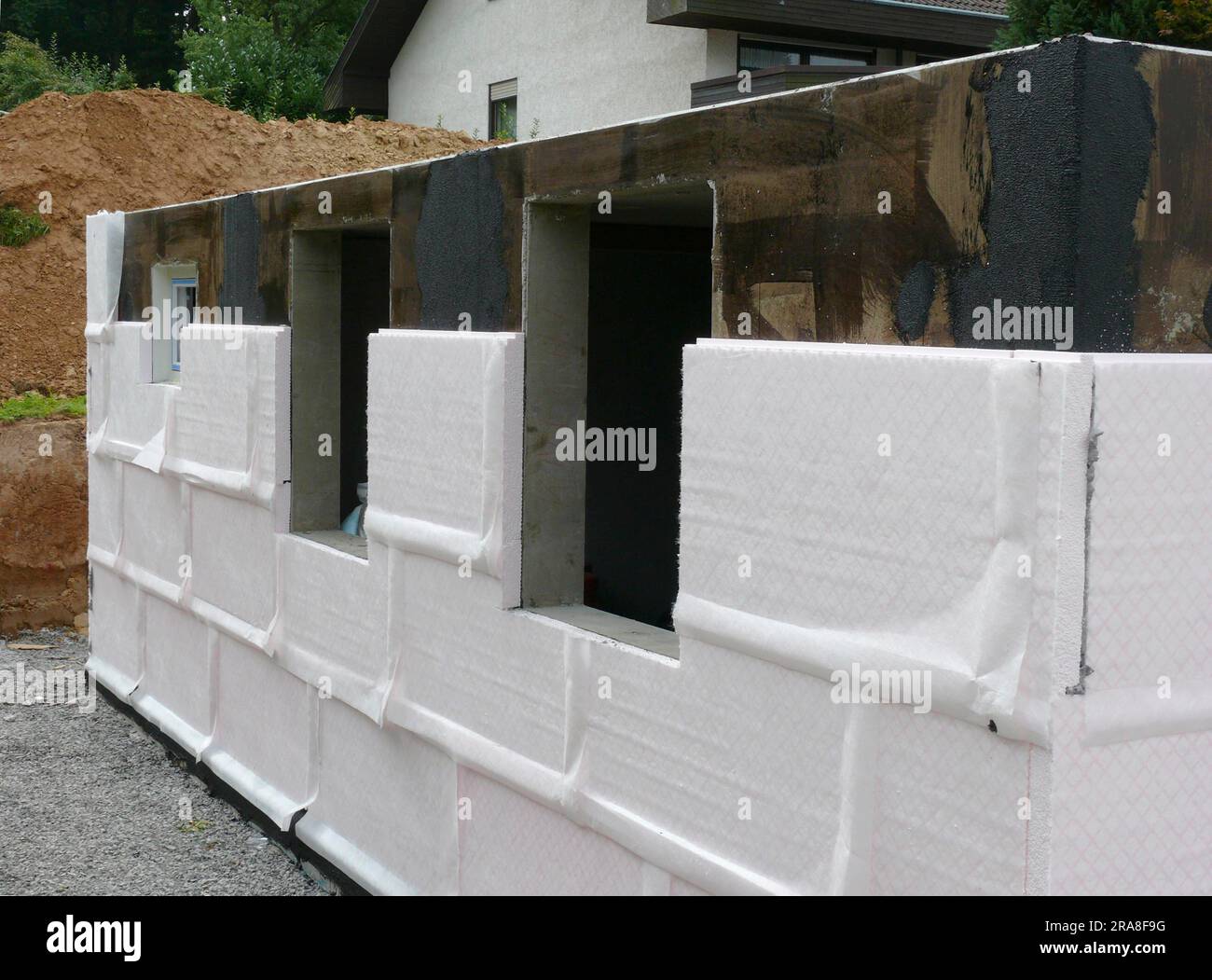 Insulation on outer cellar wall with polystyrene Stock Photo - Alamy