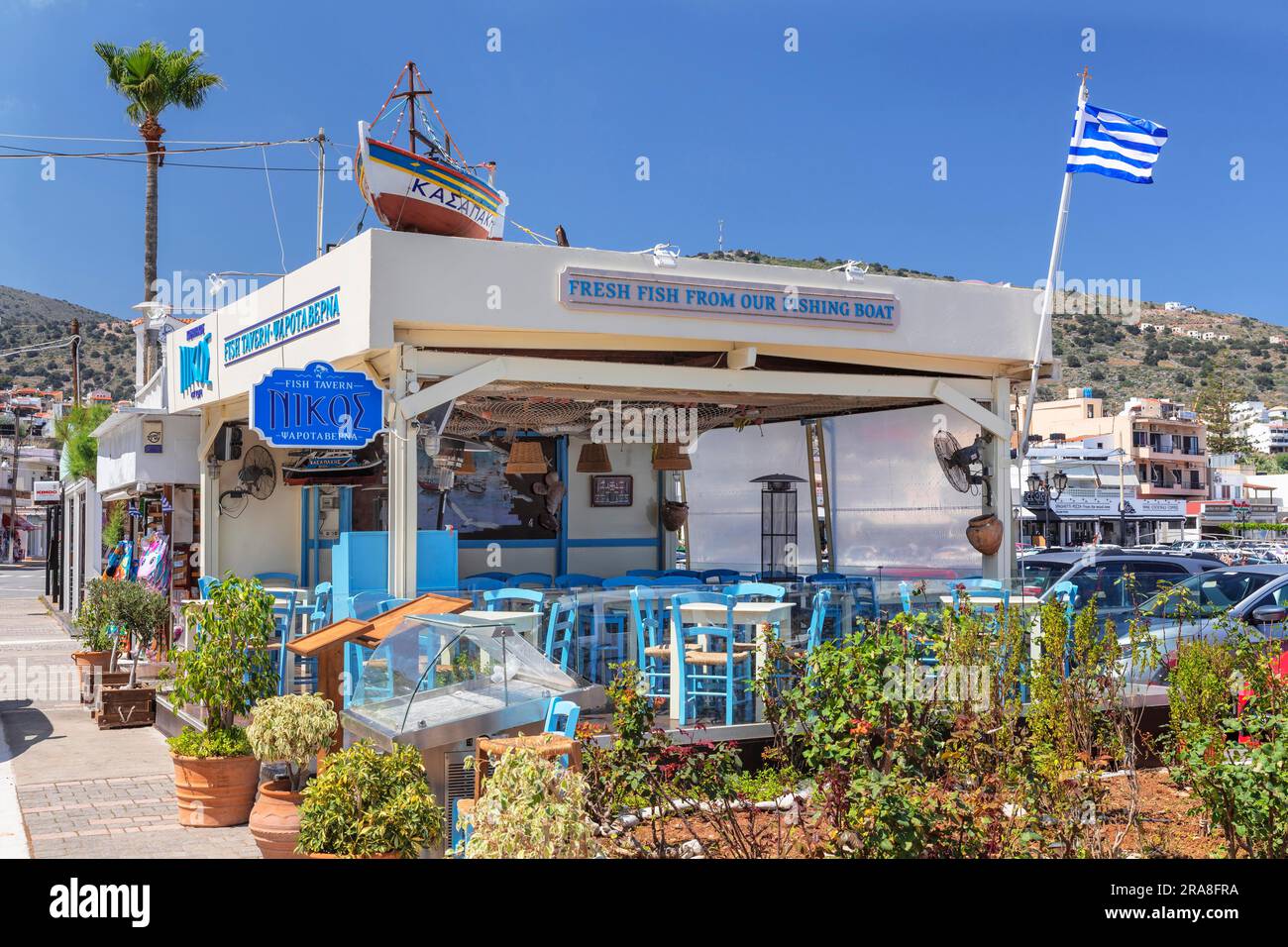Fish taverna at the port of Elounda, Gulf of Mirabello, East Crete ...