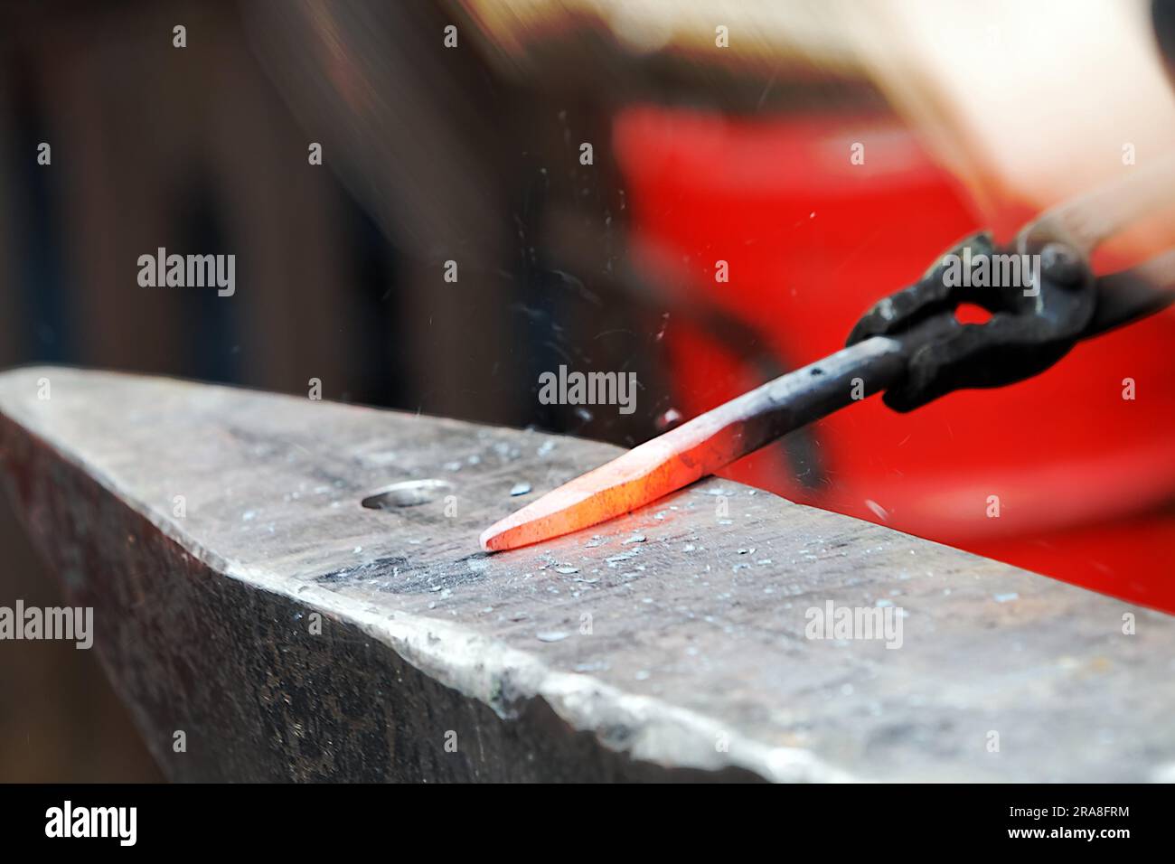 Forging..while the iron is hot Stock Photo - Alamy