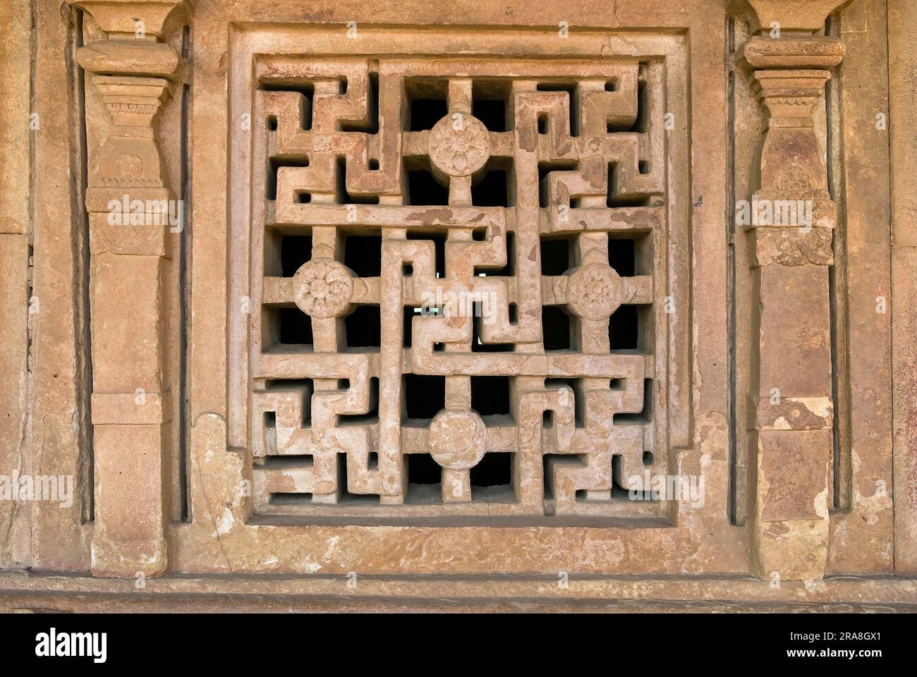 Carved stone window in Durga fortress temple in Aihole, Karnataka ...