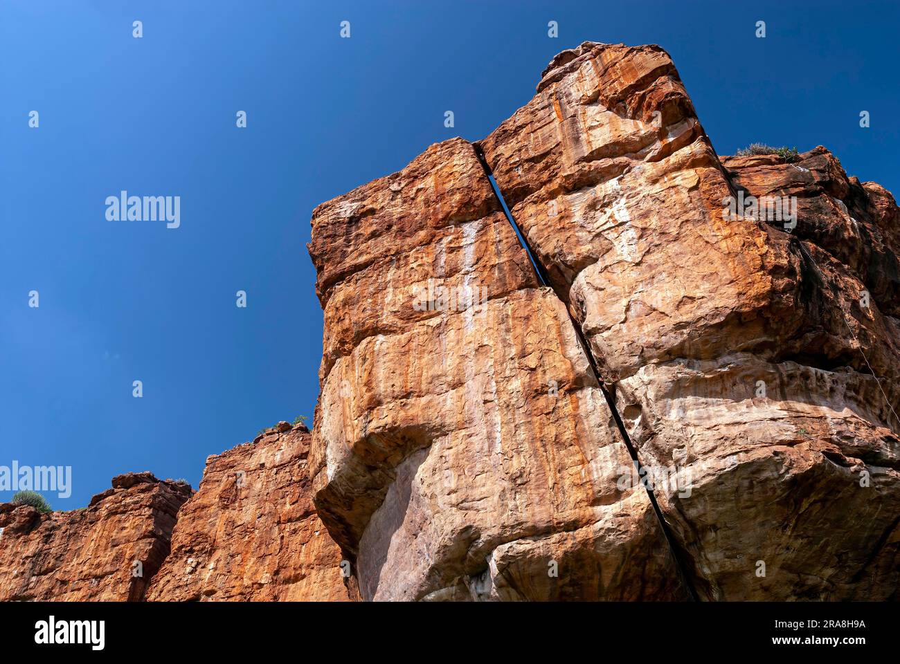 Rust red sandstone Rocks in Badami, Karnataka, South India, India, Asia ...