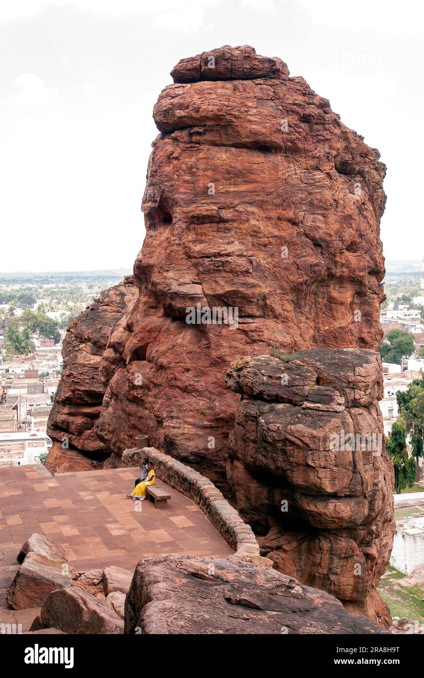 Rust red sandstone cliff in south fort, Badami, Karnataka, South India ...
