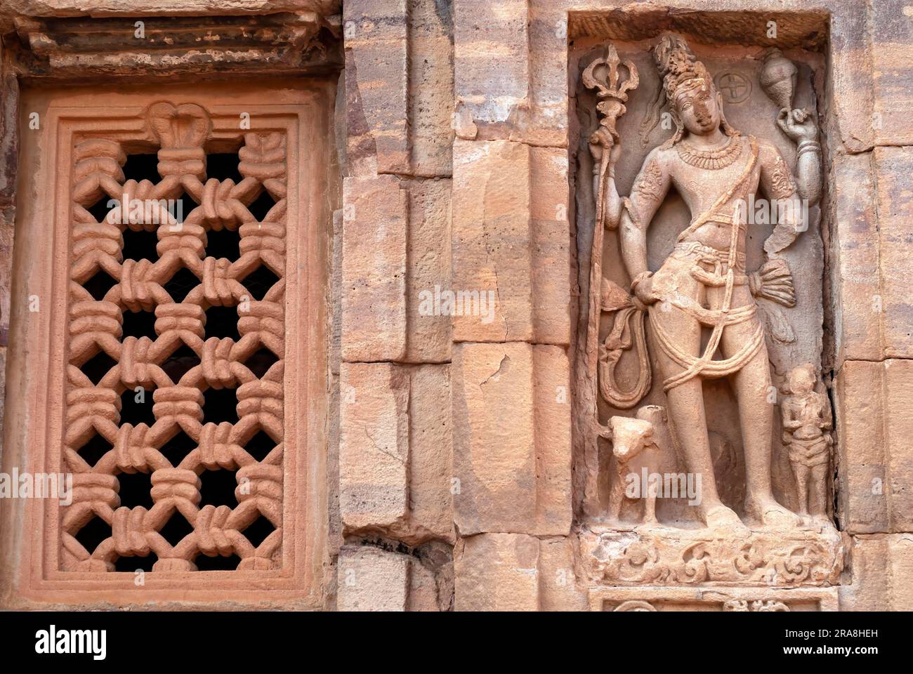 8th century Harihara sculpture and stone window, Virupaksha temple in ...