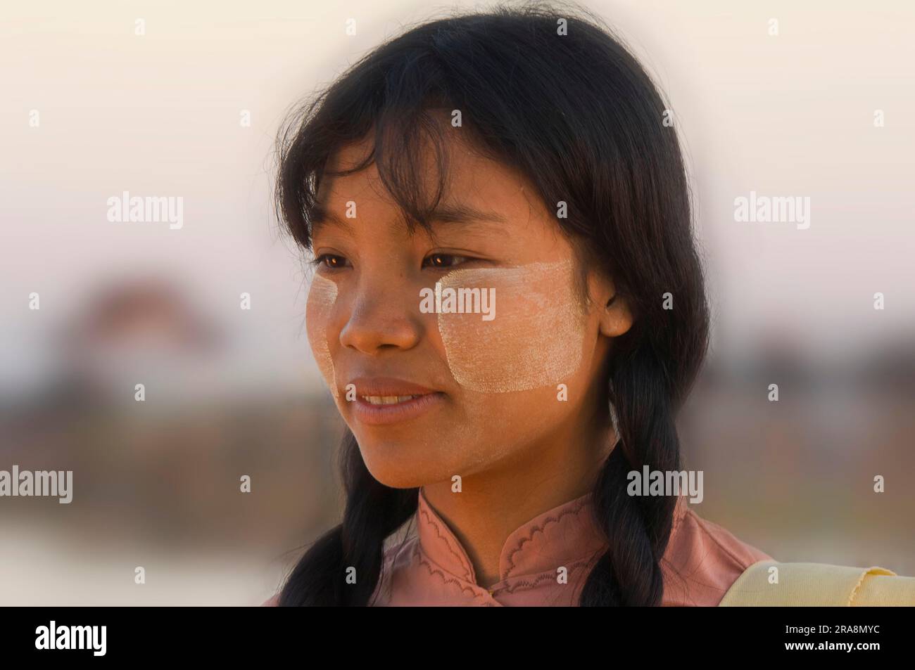 Young Burmese woman with Thanaka paste on her face, Amarapura, Burma ...