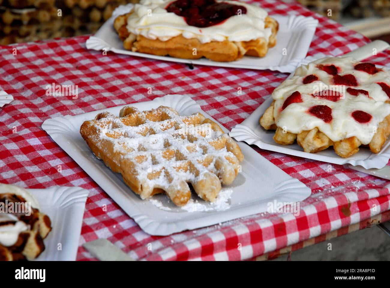 Belgian waffles on paper plate, Belgium Stock Photo - Alamy