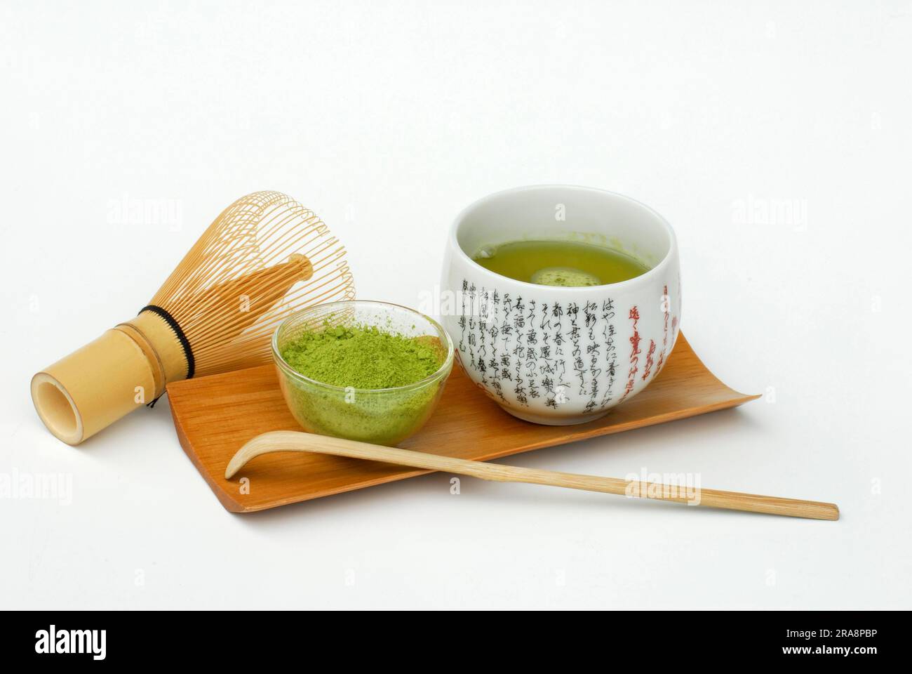 Japanese Matcha tea, 'Chasen' bamboo broom, bowl with green tea powder ...