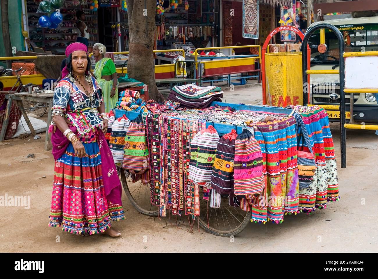 A Lambadi woman with a mobile shop in Hampi, Karnataka, South India ...