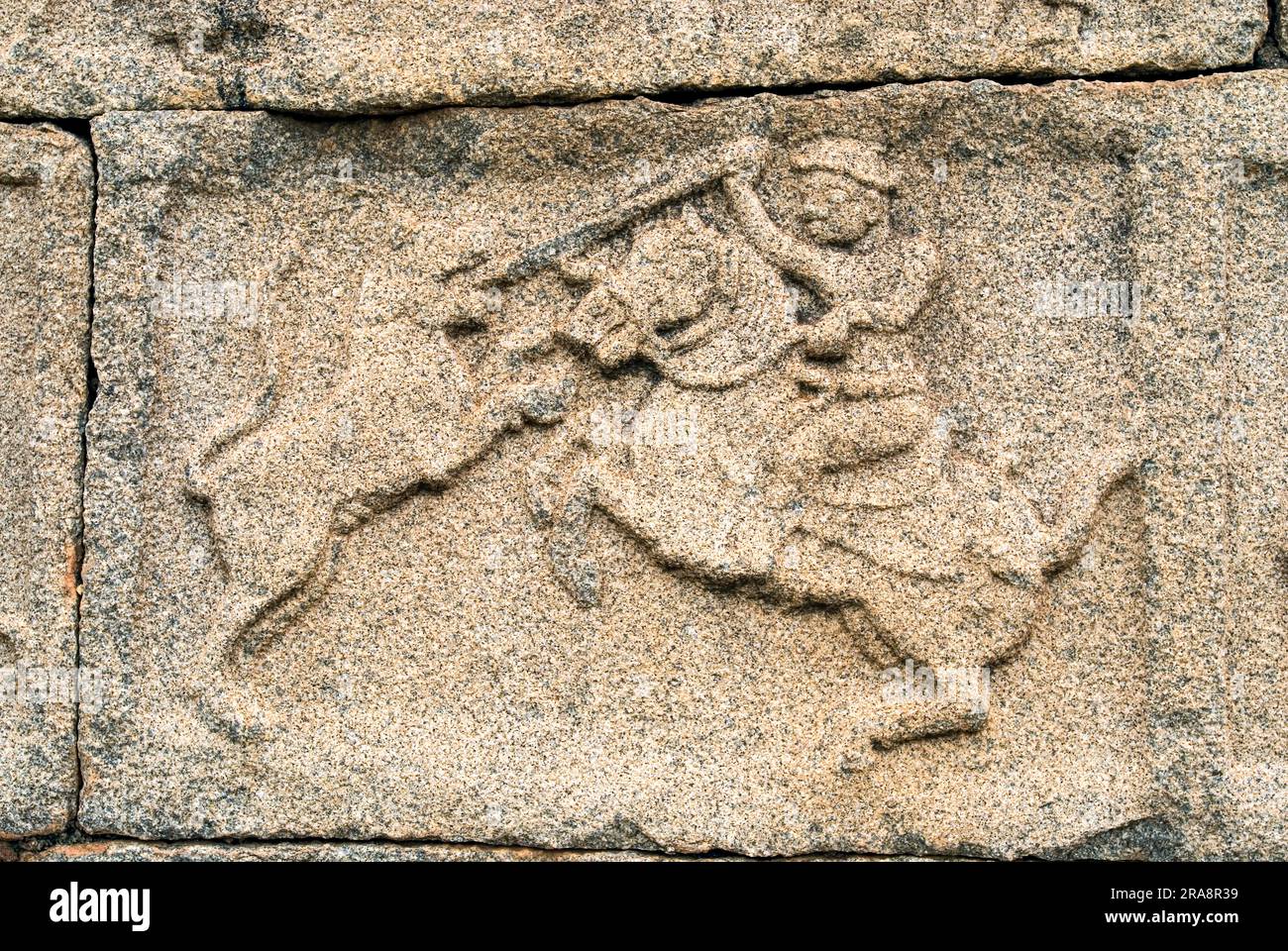 A horse man hunting bas relief on the Mahanavami Dibba wall in Royal ...