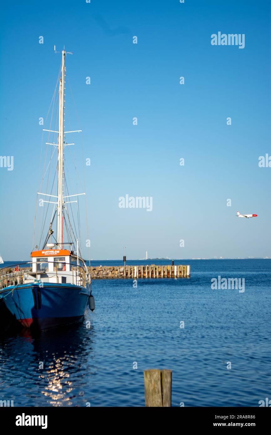 Copenhagen, Denmark, June 2023 :Sailboat lying in the harbour with view ...