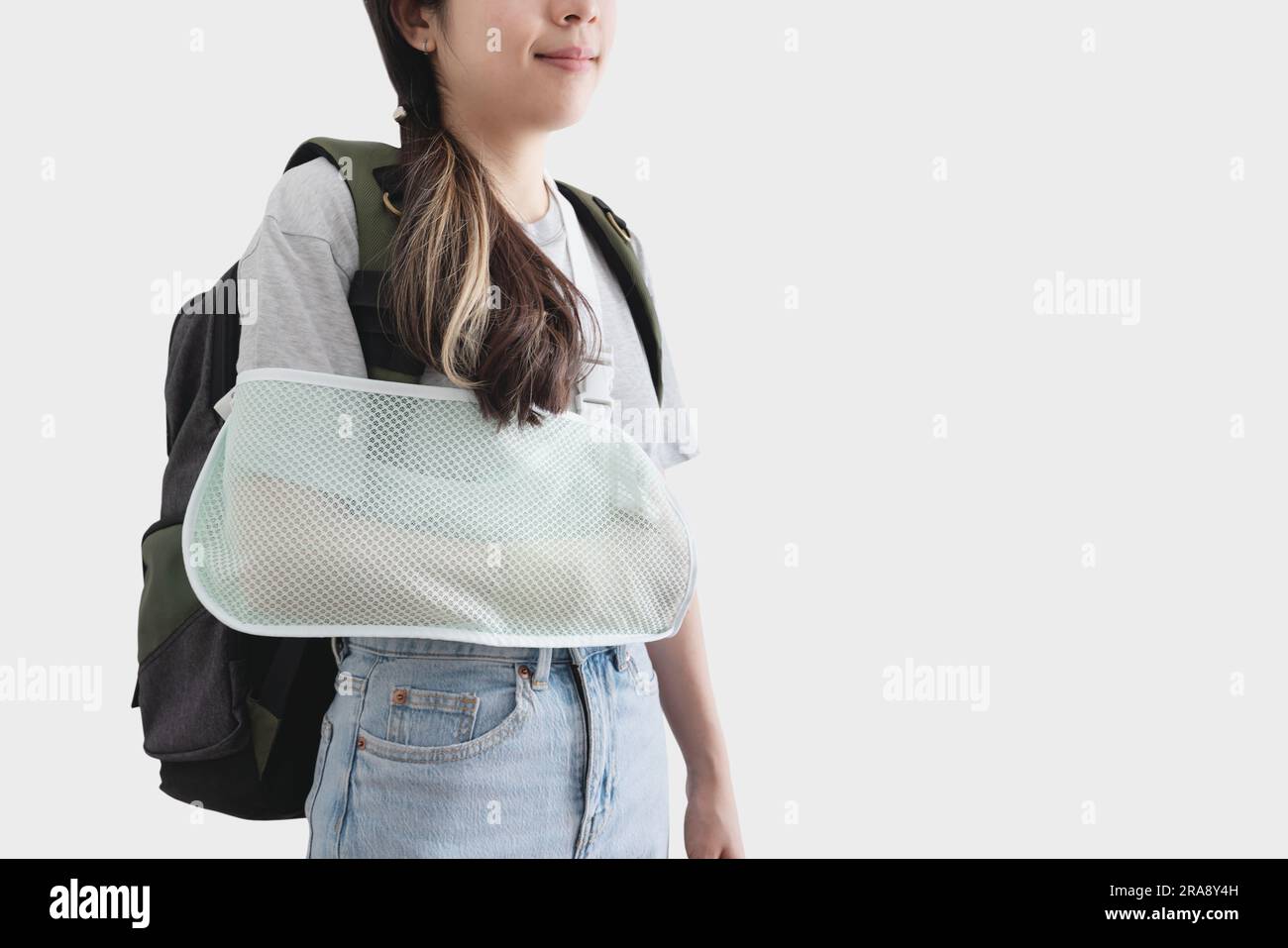 Travel insurance concepts. Young woman with hand injured wearing splint ...