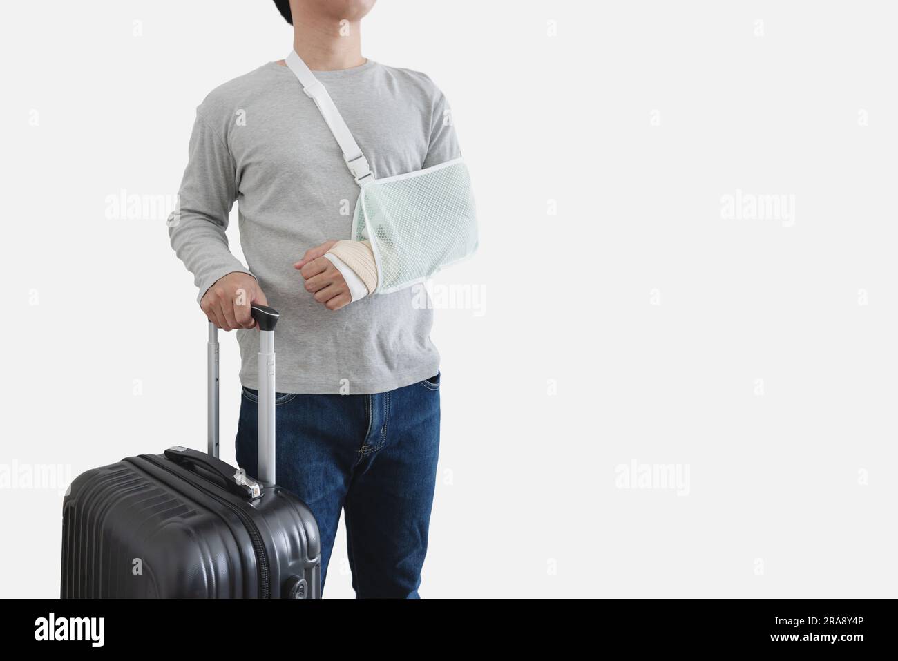 Travel insurance concepts. Young man with hand injured wearing splint ...