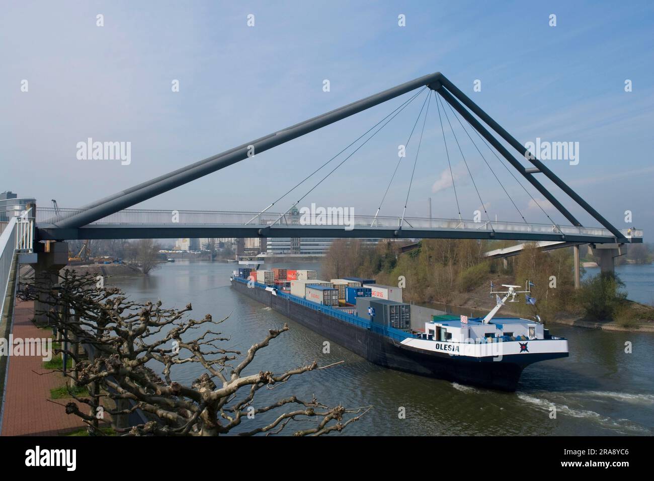 Pedestrian bridge, cargo ship on the Rhine, Media Harbour, Duesseldorf ...