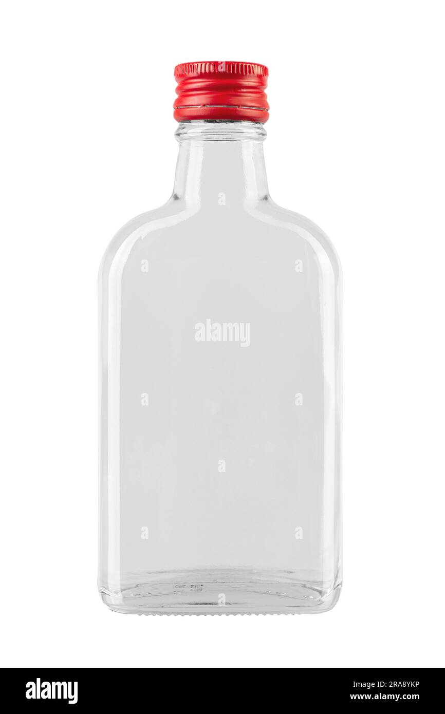 Empty glass bottle with a red cap from a medicine or an alcoholic drink ...