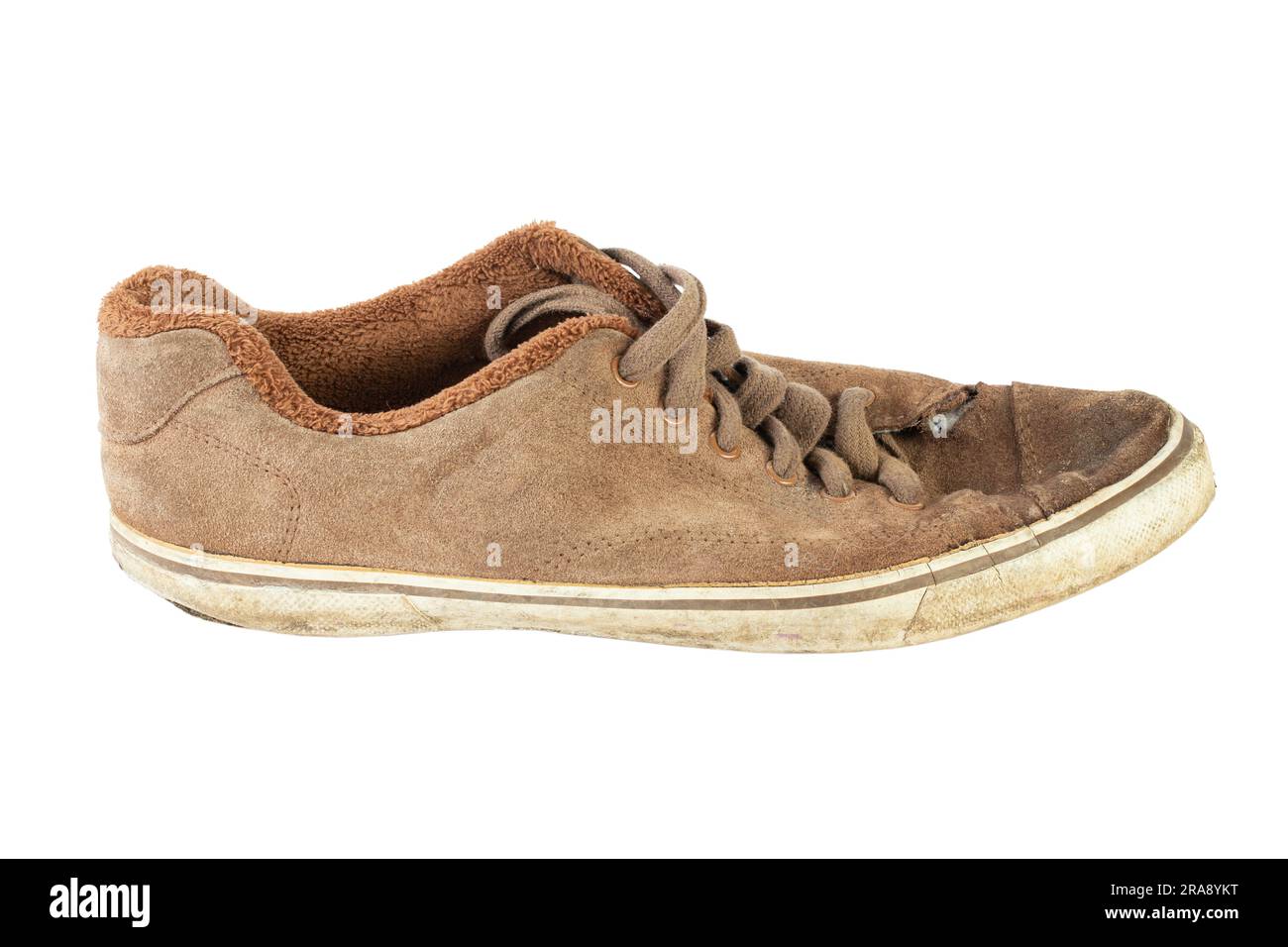 Old dirty brown sneakers, isolated on white background. The file ...