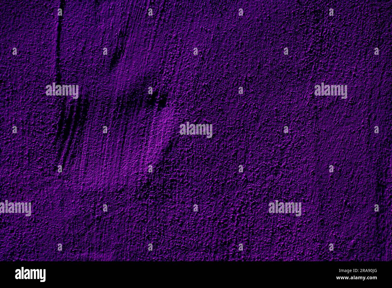 Purple colored abstract wall background with textures of different ...