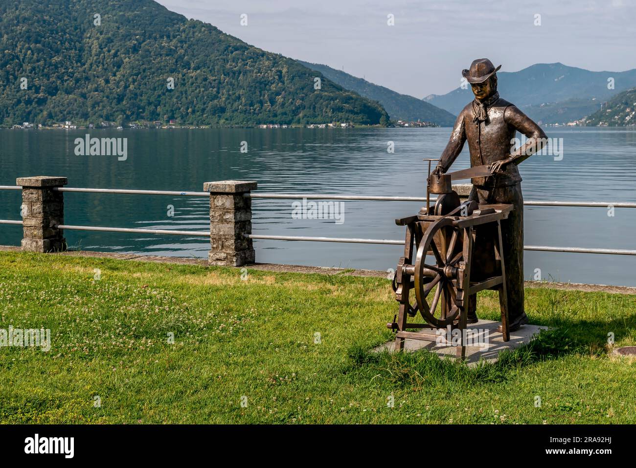 A bronze sculpture depicting a knife grinder on the lakefront of ...