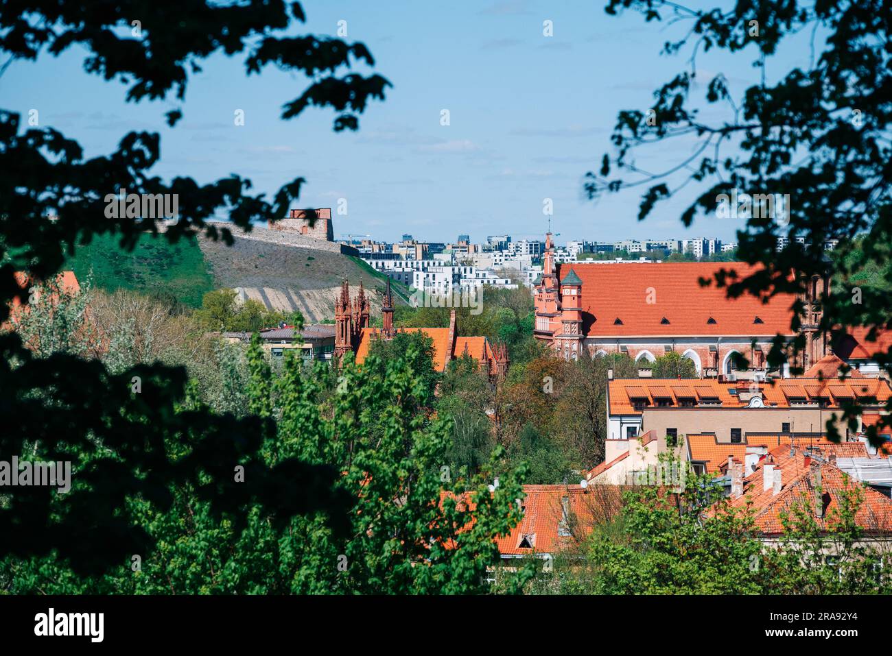 Vilnius, Lithuania - 06 05 2023: View of the old city with orange roofs ...