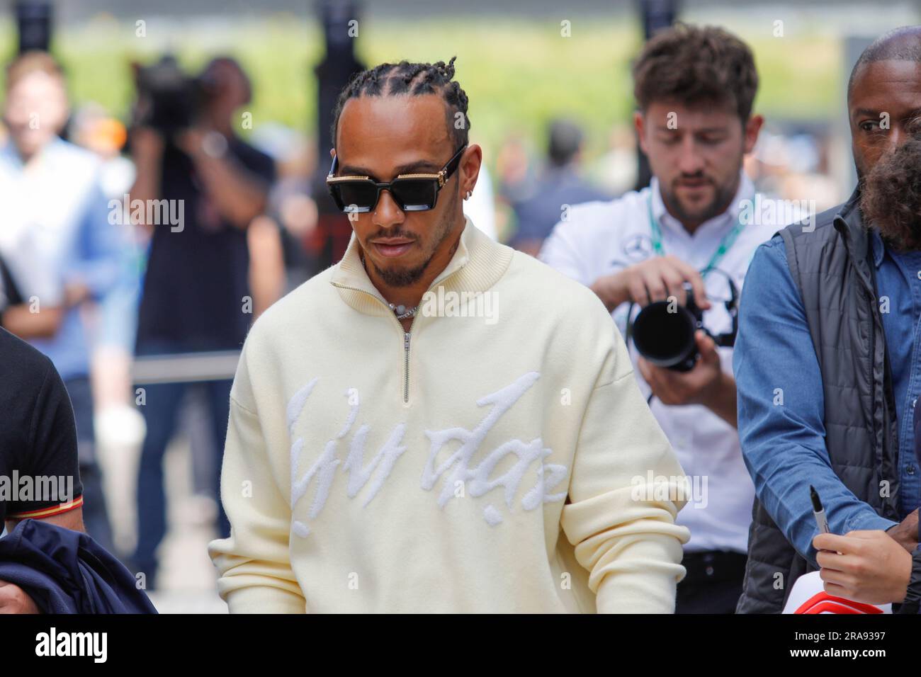 Lewis hamilton entering paddock hi-res stock photography and images - Alamy