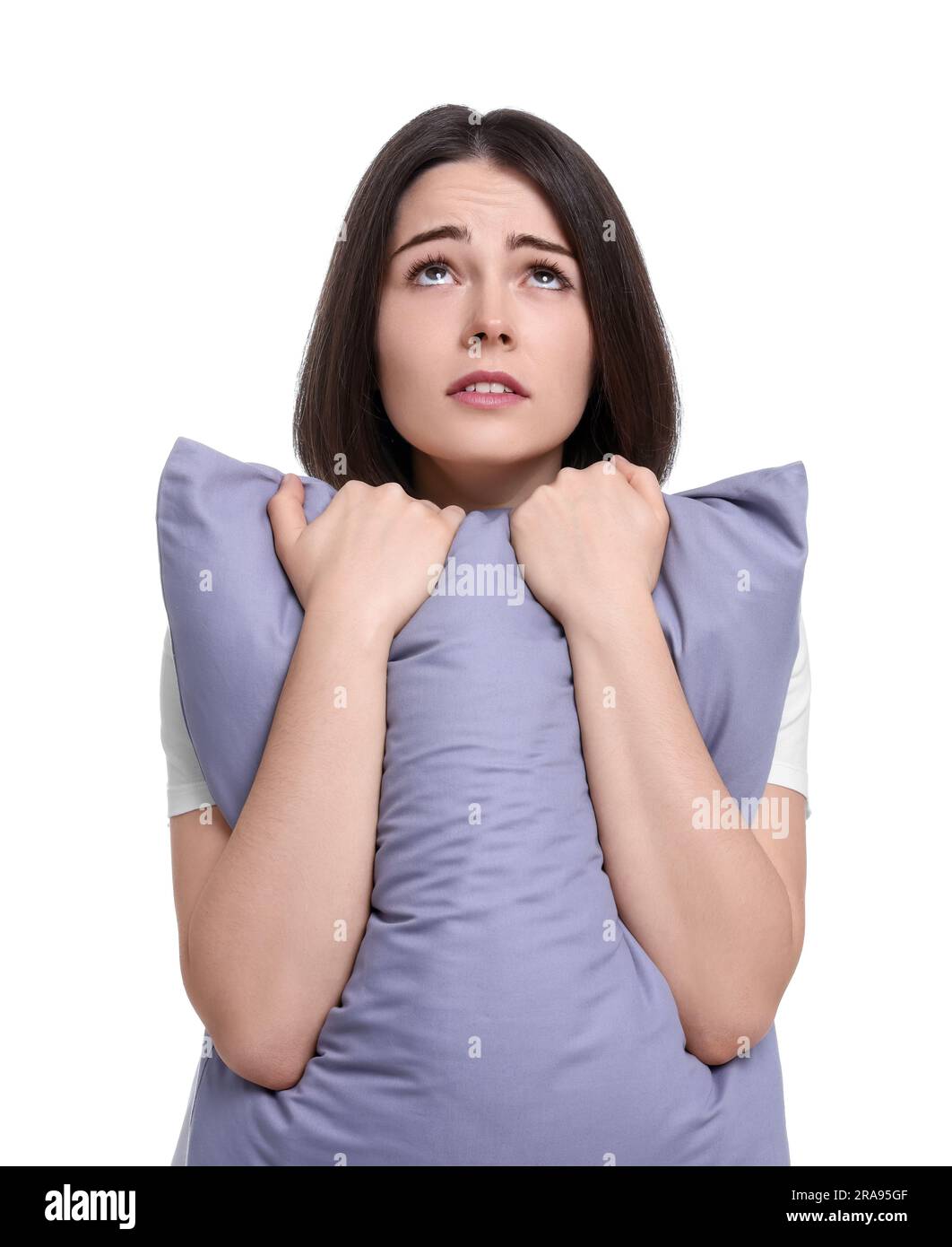 Unhappy young woman with pillow on white background. Insomnia problem ...