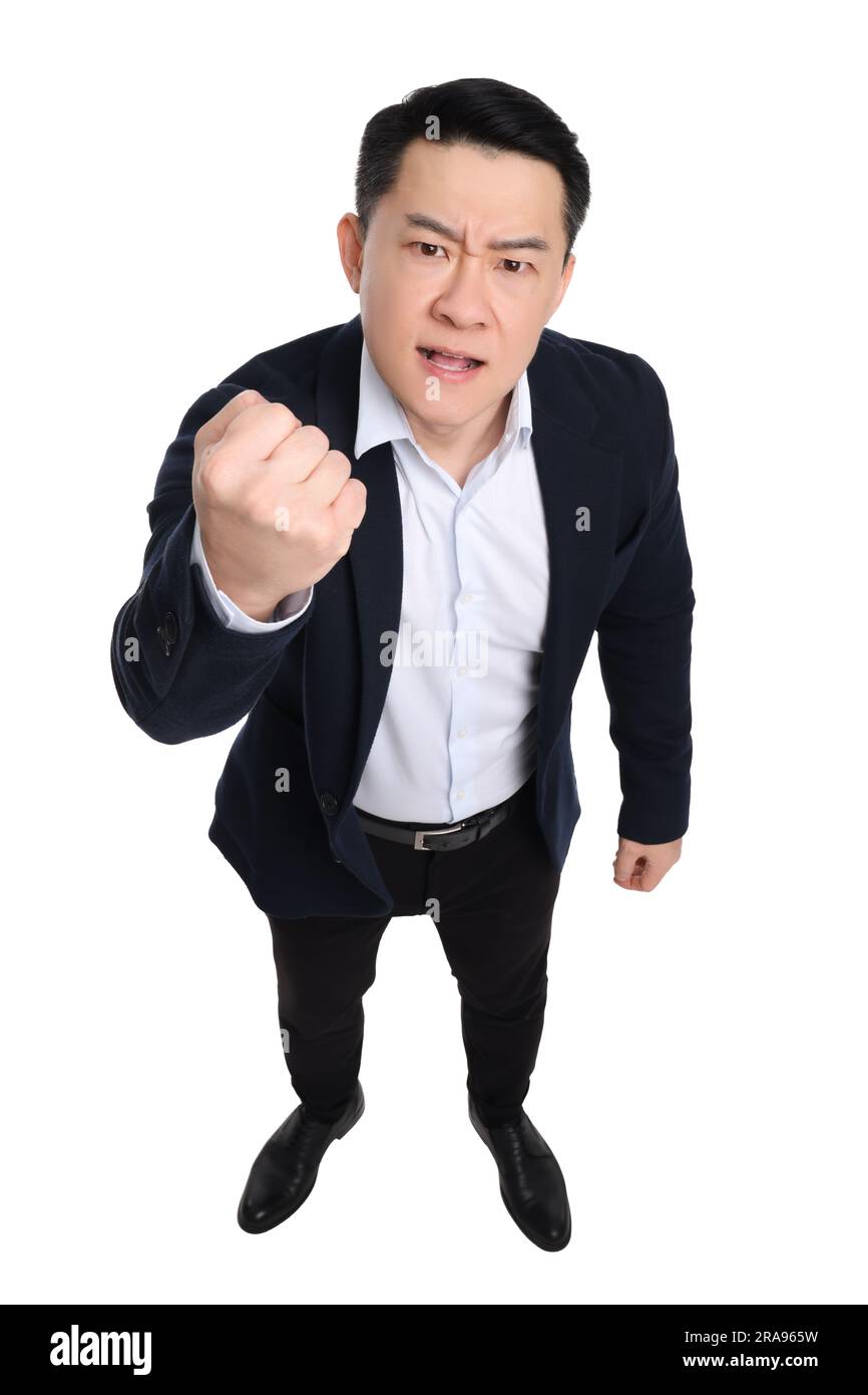 Angry businessman in suit posing on white background, above view Stock ...