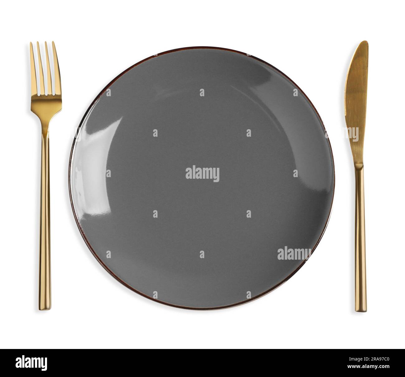 Empty plate, fork and knife on white background, top view Stock Photo - Alamy