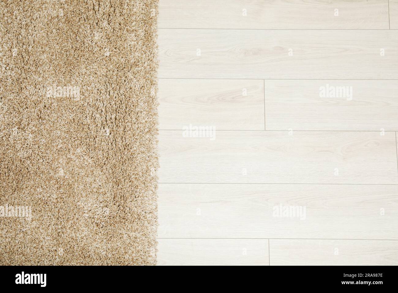 Beautiful beige carpet on floor, top view. Space for text Stock Photo ...