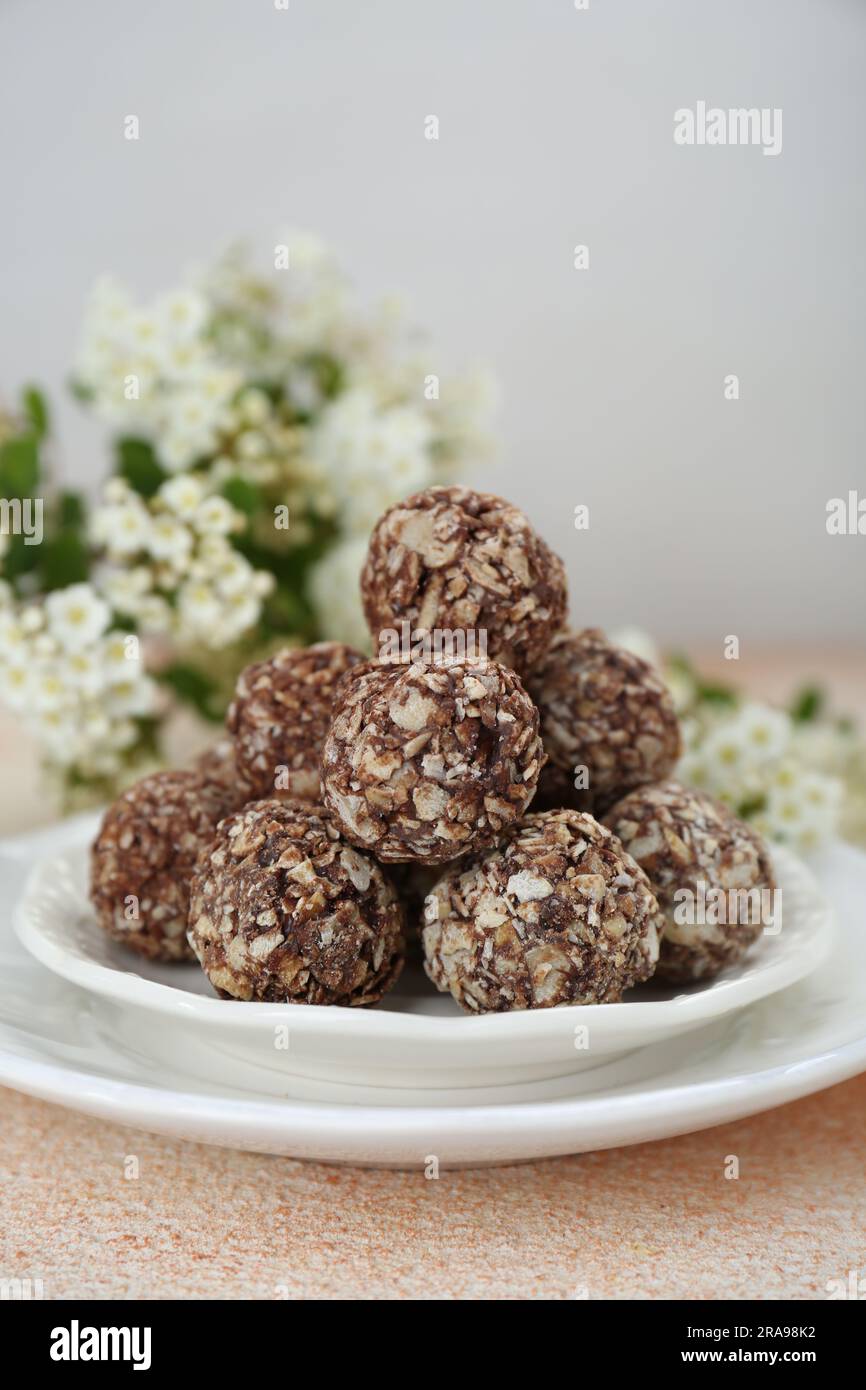 Delicious sweet chocolate candies on beige table Stock Photo - Alamy