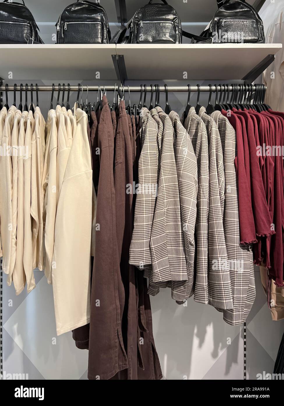 Fashion store with different clothes and accessories Stock Photo - Alamy