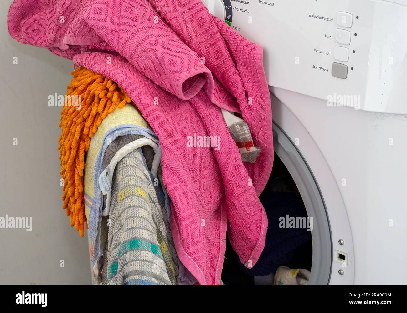 white washing machine and laundry Stock Photo - Alamy
