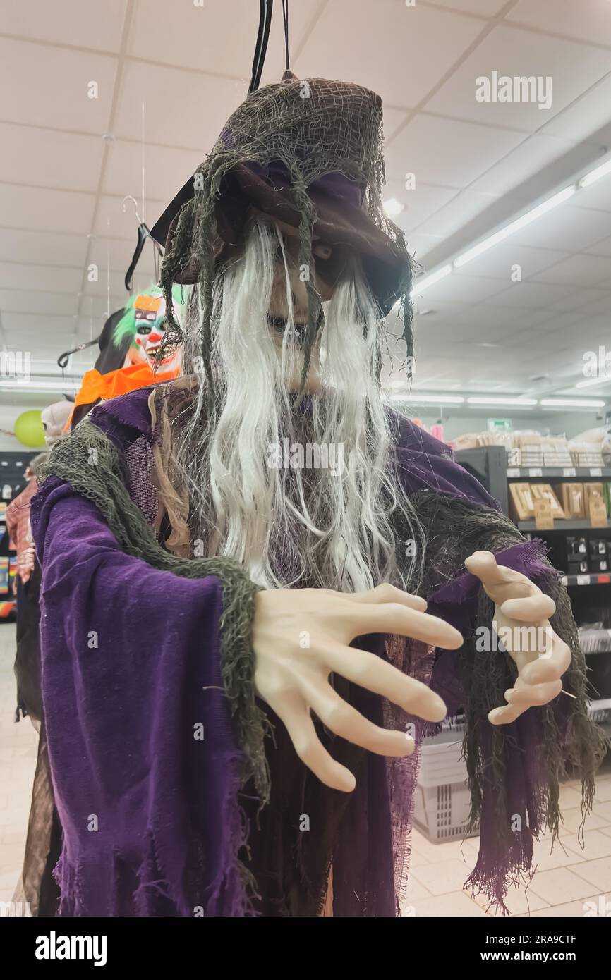 A witch in a shop Halloween Costume Store Stock Photo - Alamy