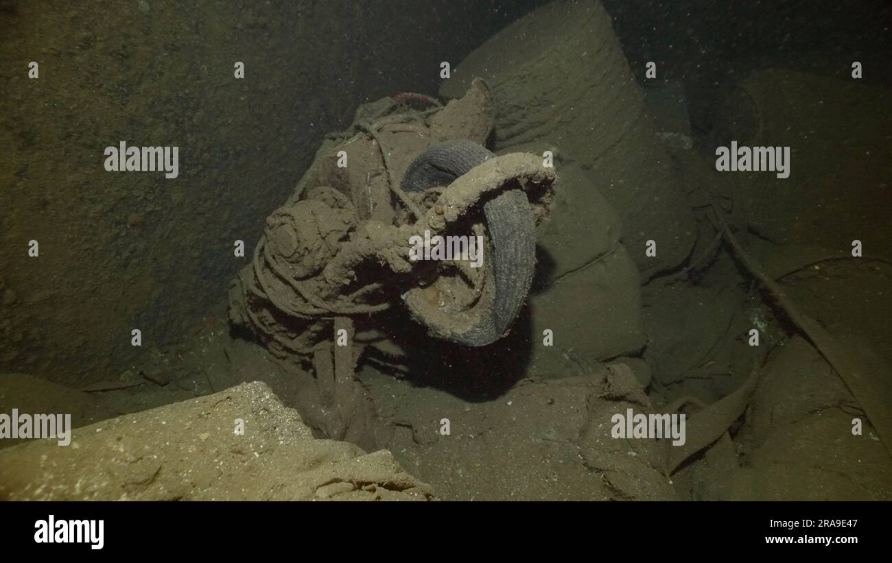 Wheelbarrow, barrels and other cargo inside hold of ferry Salem Express ...