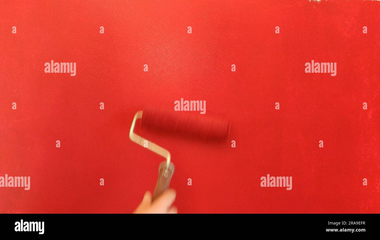 Hand paints wall white paint hi-res stock photography and images - Alamy