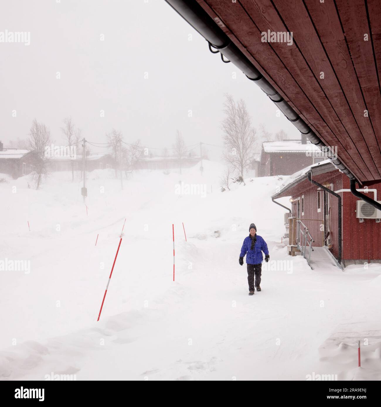 HEMAVAN, SWEDEN ON MARCH 17, 2023. Mountain lodges in a blizzard. An ...