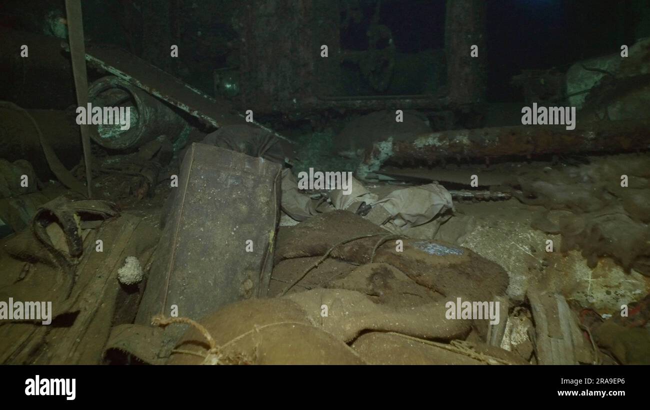 Passengers luggage and personal belongings lie inside hold of ferry ...