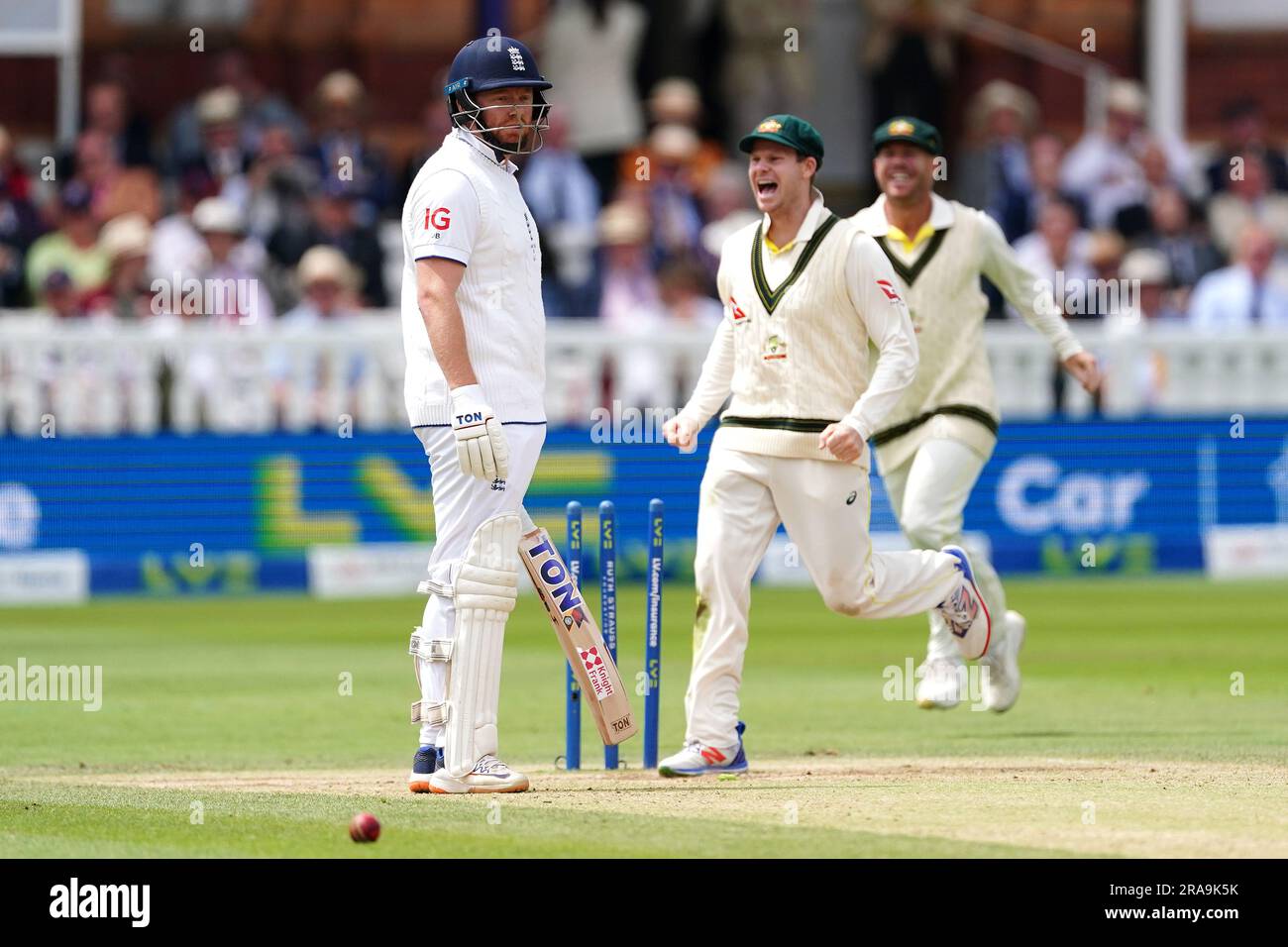 England's Jonny Bairstow (left) looks frustrated after being run out by ...