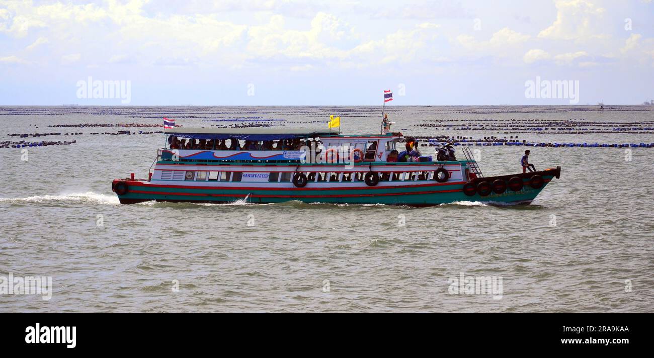 Ferry arriving at Koh Loy, a small floating island, connected to the ...