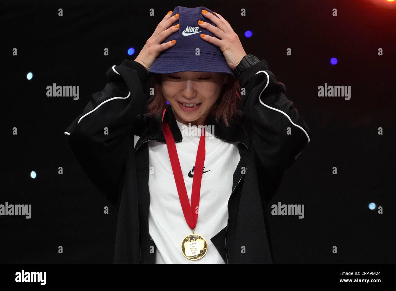 Japan's Ayumi reacts after receiving her gold medal for the 1vs1 b-girl ...