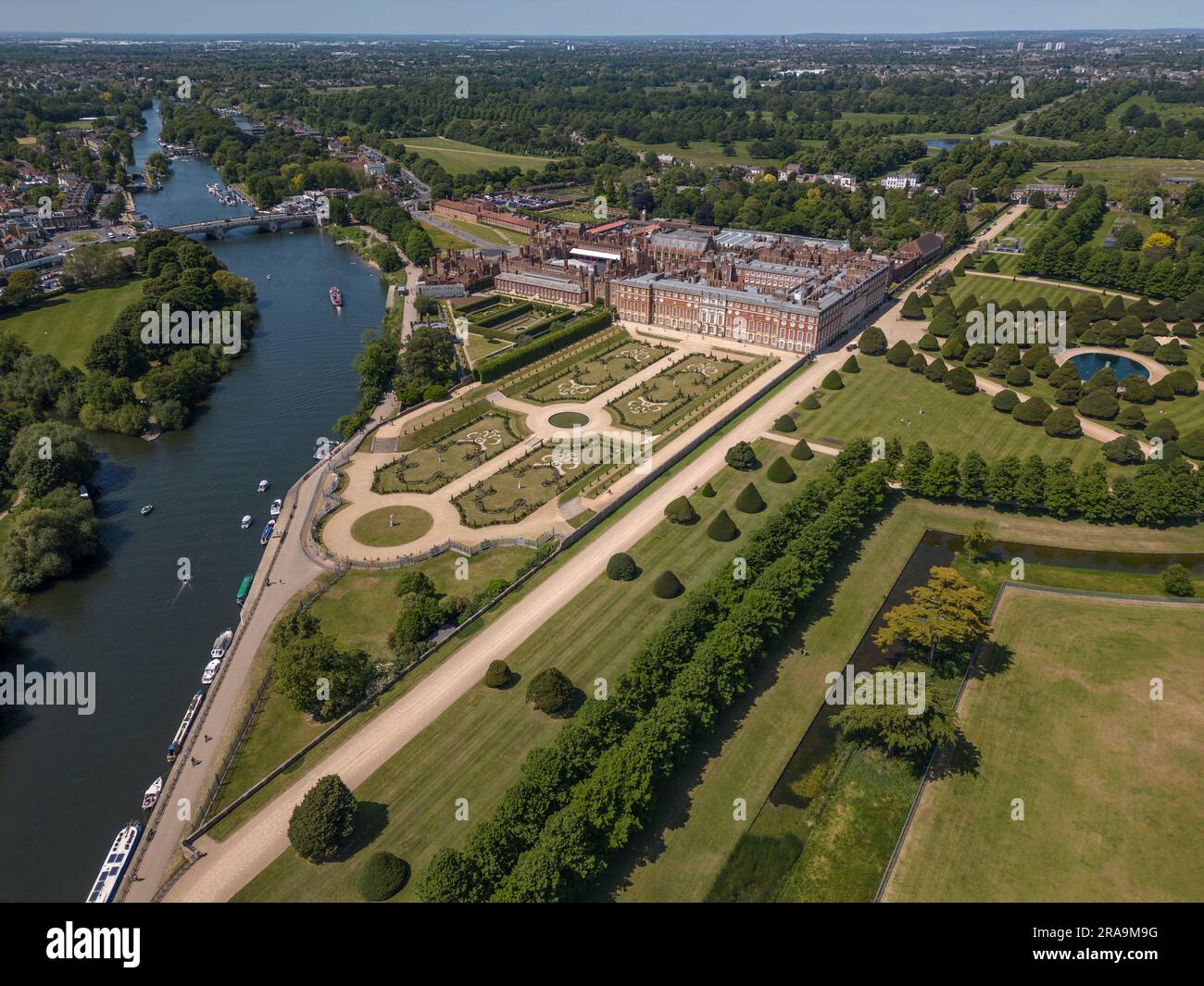 Aerial view of Hampton Court Palace and the River Thames, Surrey, UK ...
