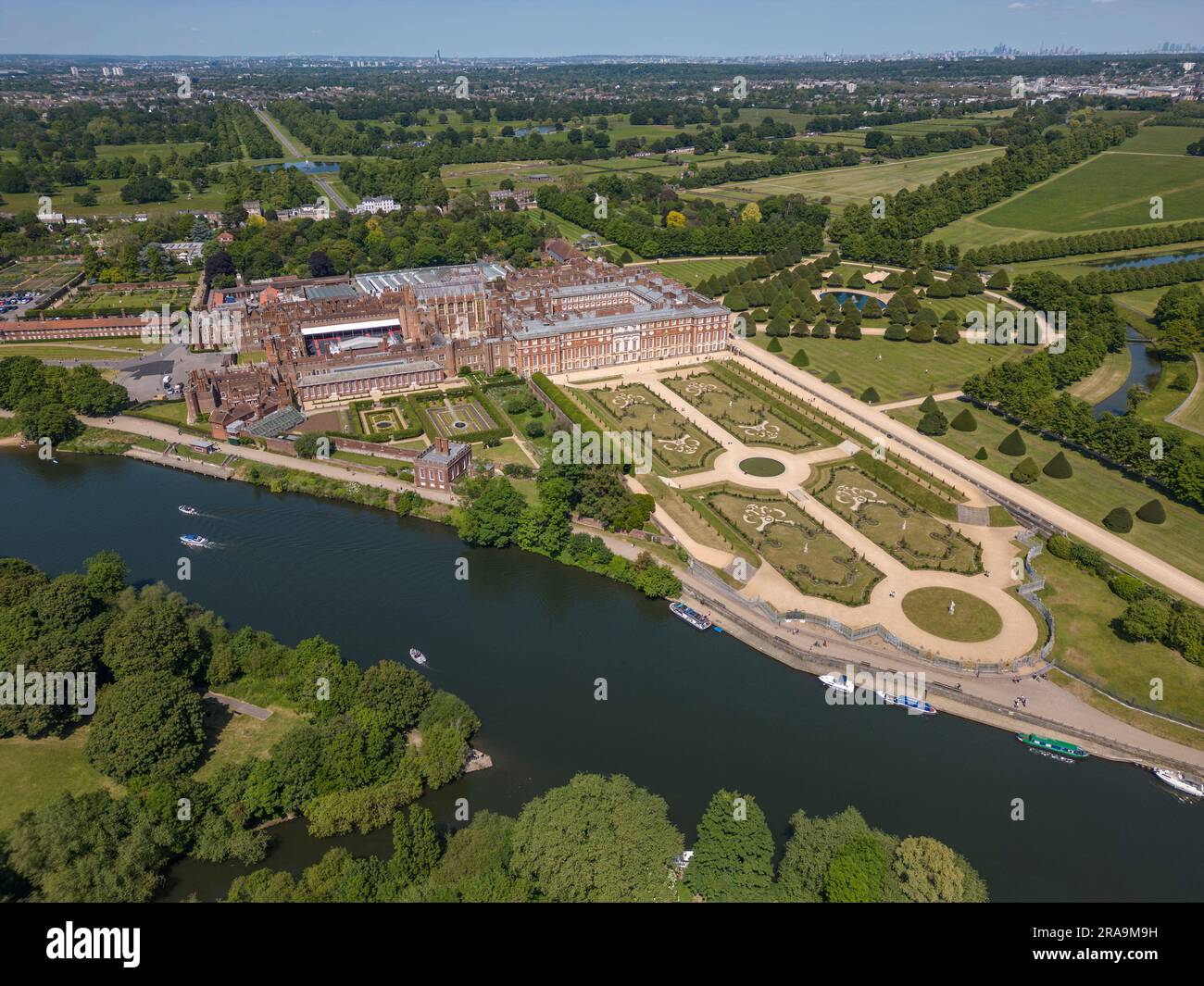 Aerial view of Hampton Court Palace and the River Thames, Surrey, UK ...