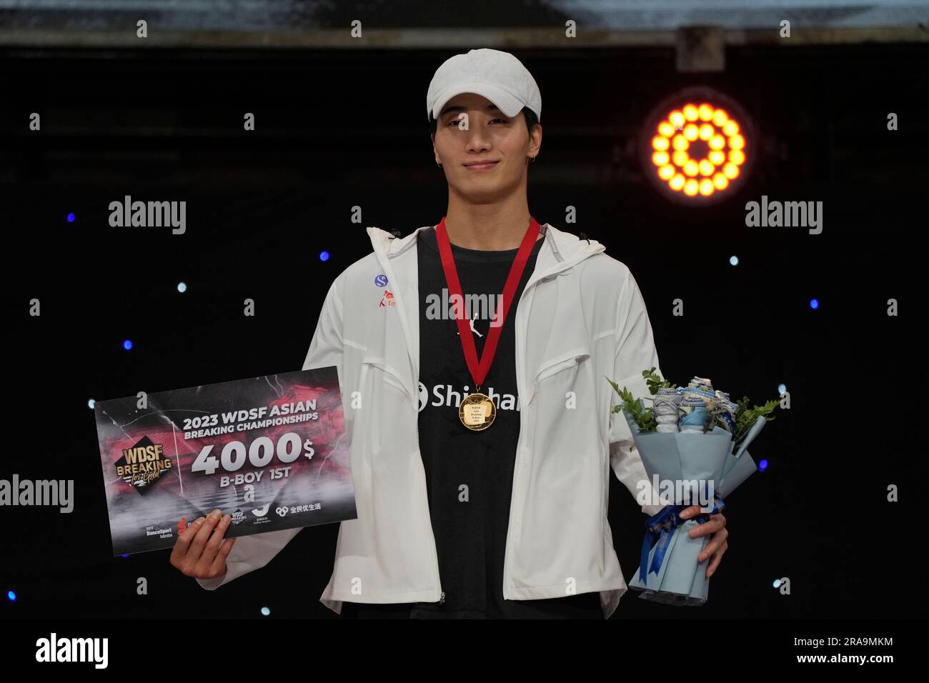 Gold medalist South Korea's Wing poses for photos at the podium after ...
