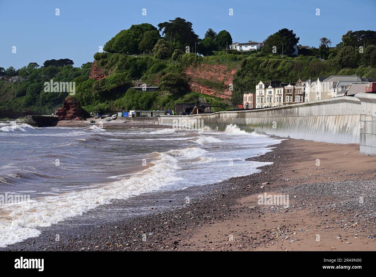 Incoming tide along the new seawall at Dawlish, South Devon, looking ...