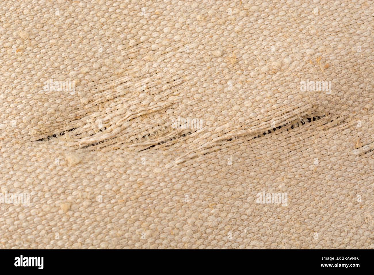 Close-up shot of worn seat fabric - appears to be mixed fibre not 100% ...